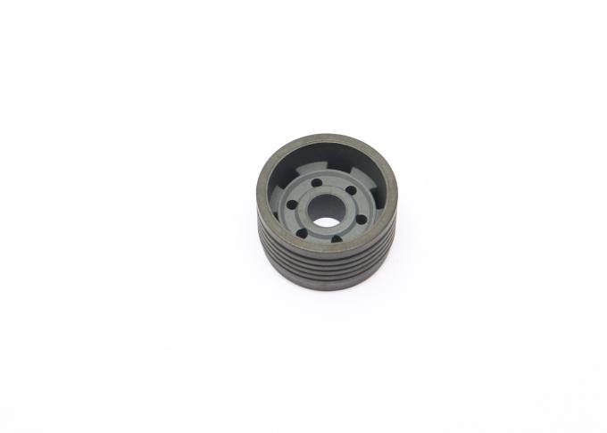Aluminum / zinc alloy sinter damper piston with one time molding pressing